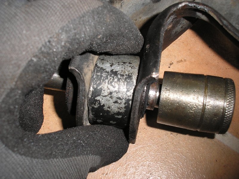 The socket arbor on its guide in position to push out the bushing.